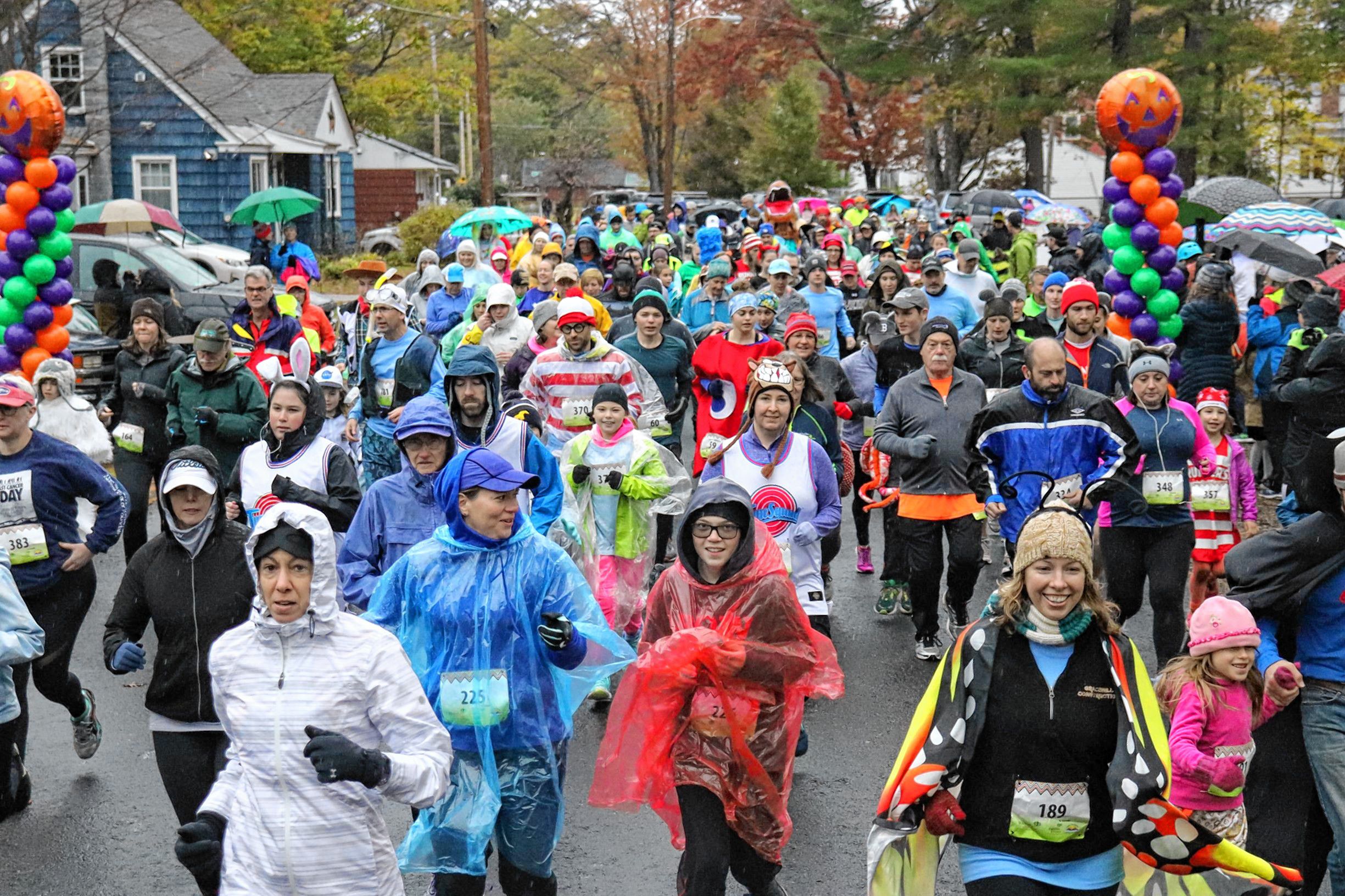Hundreds brave the weather, raise more than $30,000 in Wicked FIT Run ...